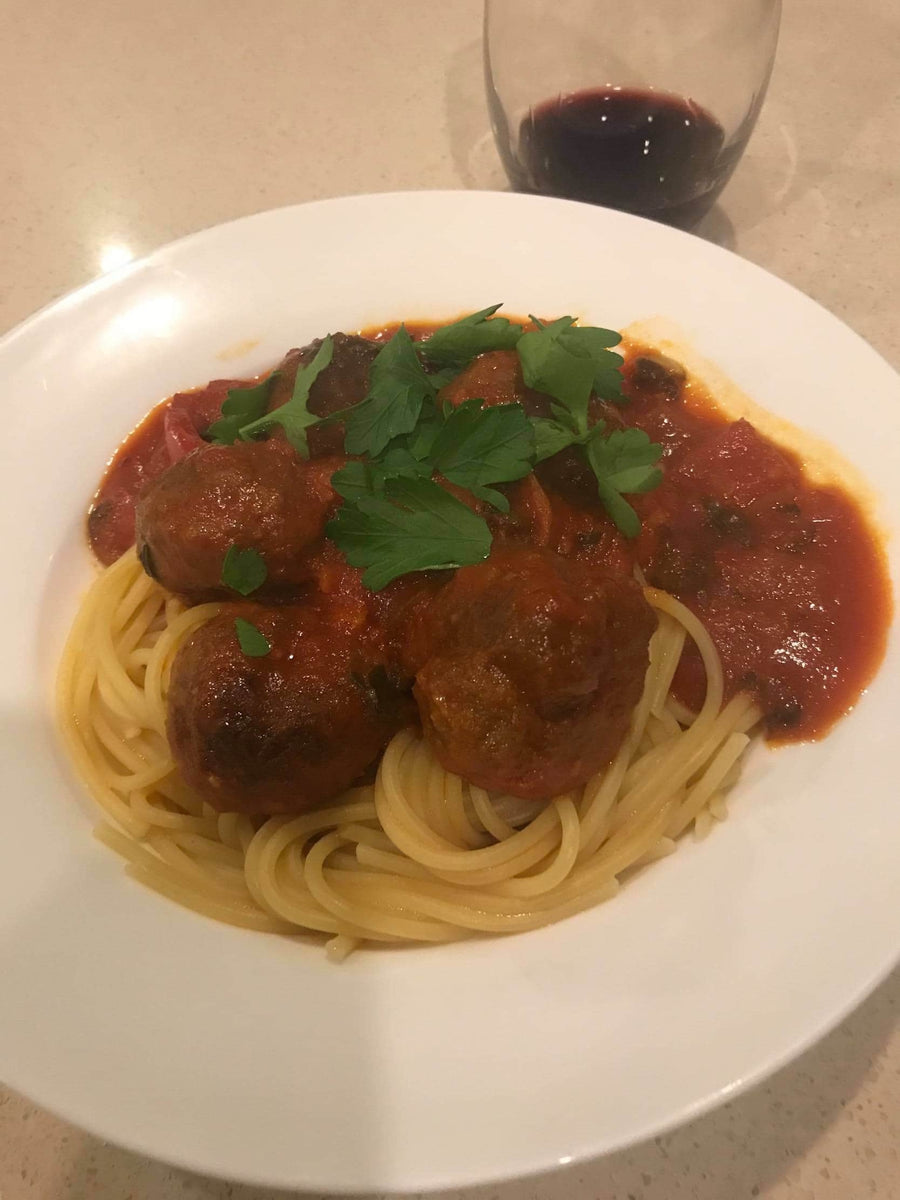 Kit and Jamie’s Four Daughters Cheatballs with a glass of Red.